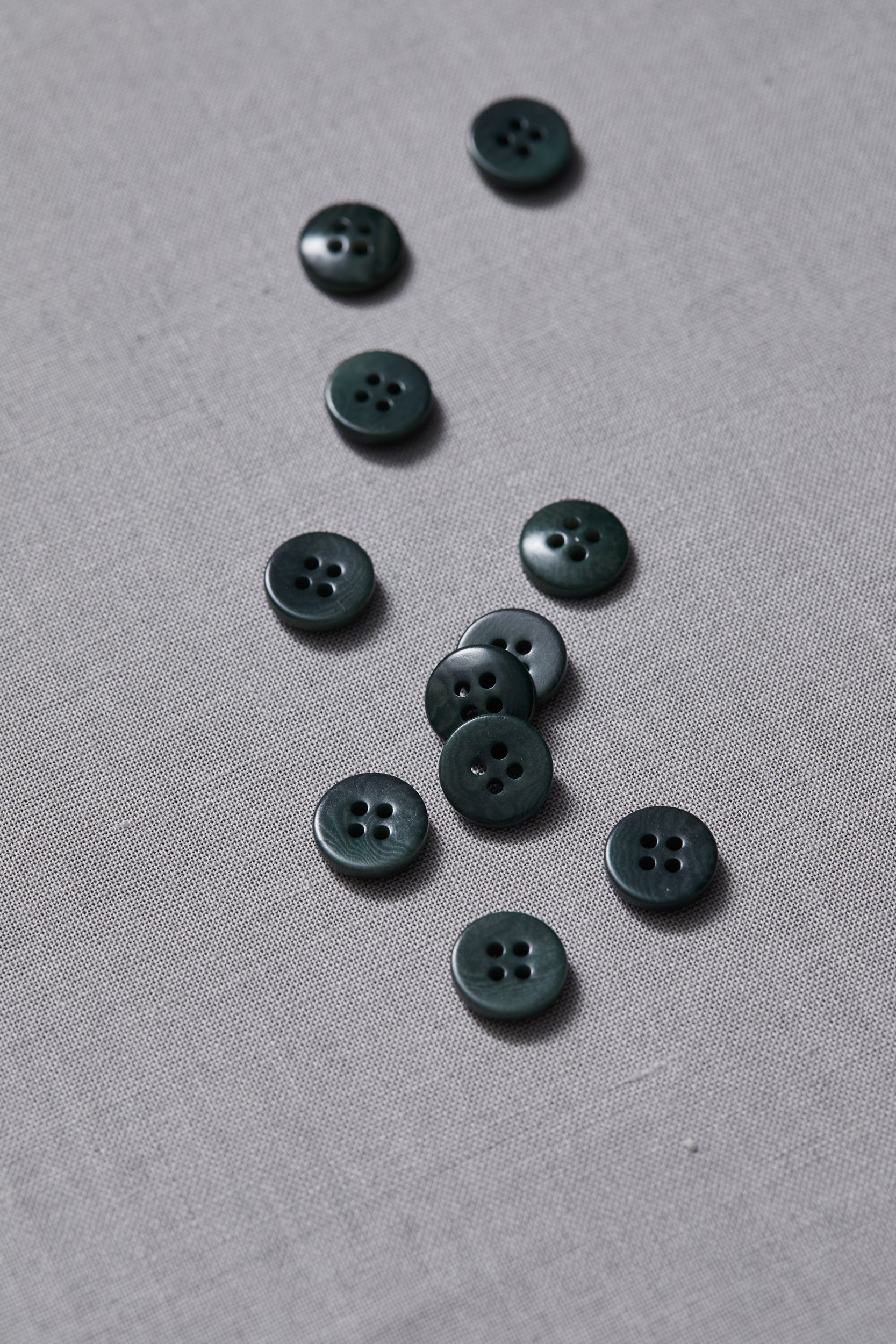 PLAIN 4 HOLE COROZO BUTTON | Emerald 11mm – Paper Scissors Cloth